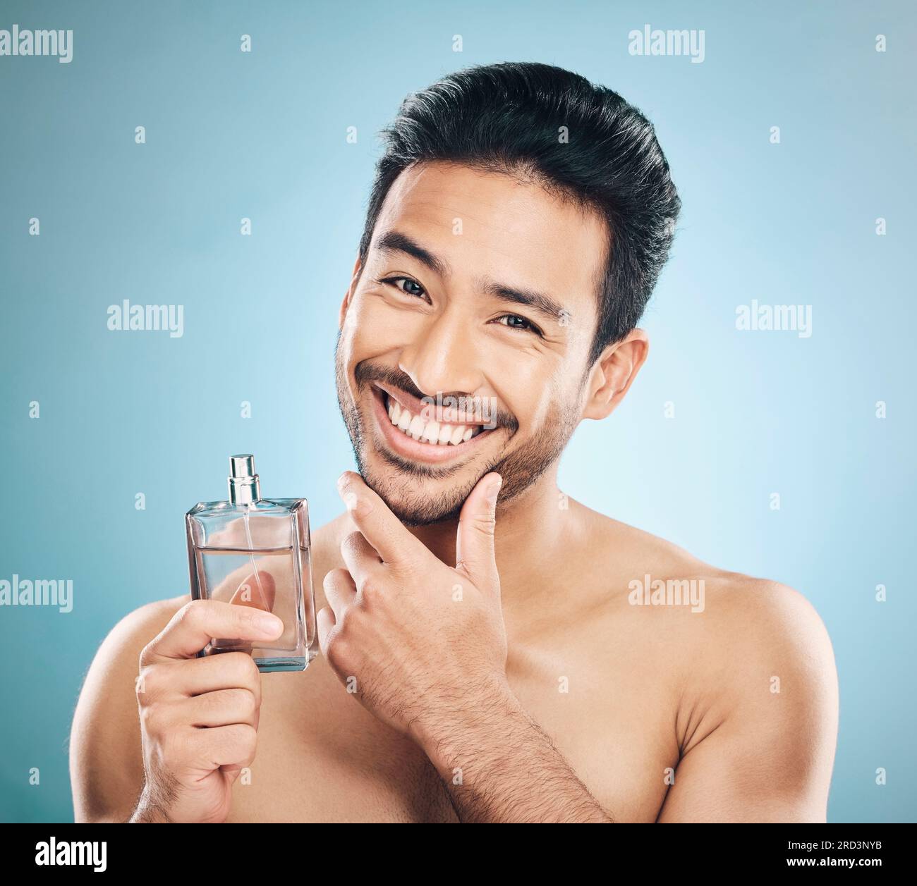 Portrait, perfume and man with cologne, self care and grooming against ...