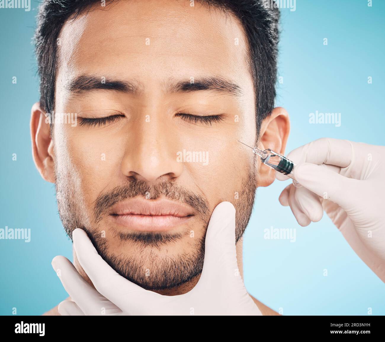 Face, hands and change with a plastic surgery man in studio on a blue ...