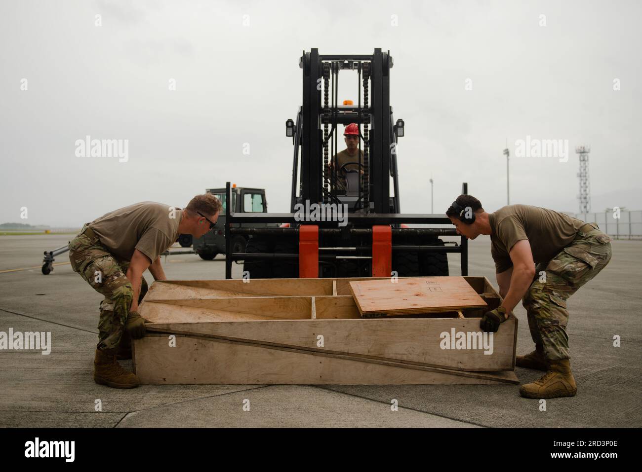 U.S. Air Force Staff Sgt. Phillip Engle and Tech. Sgt. Ted Debauge ...