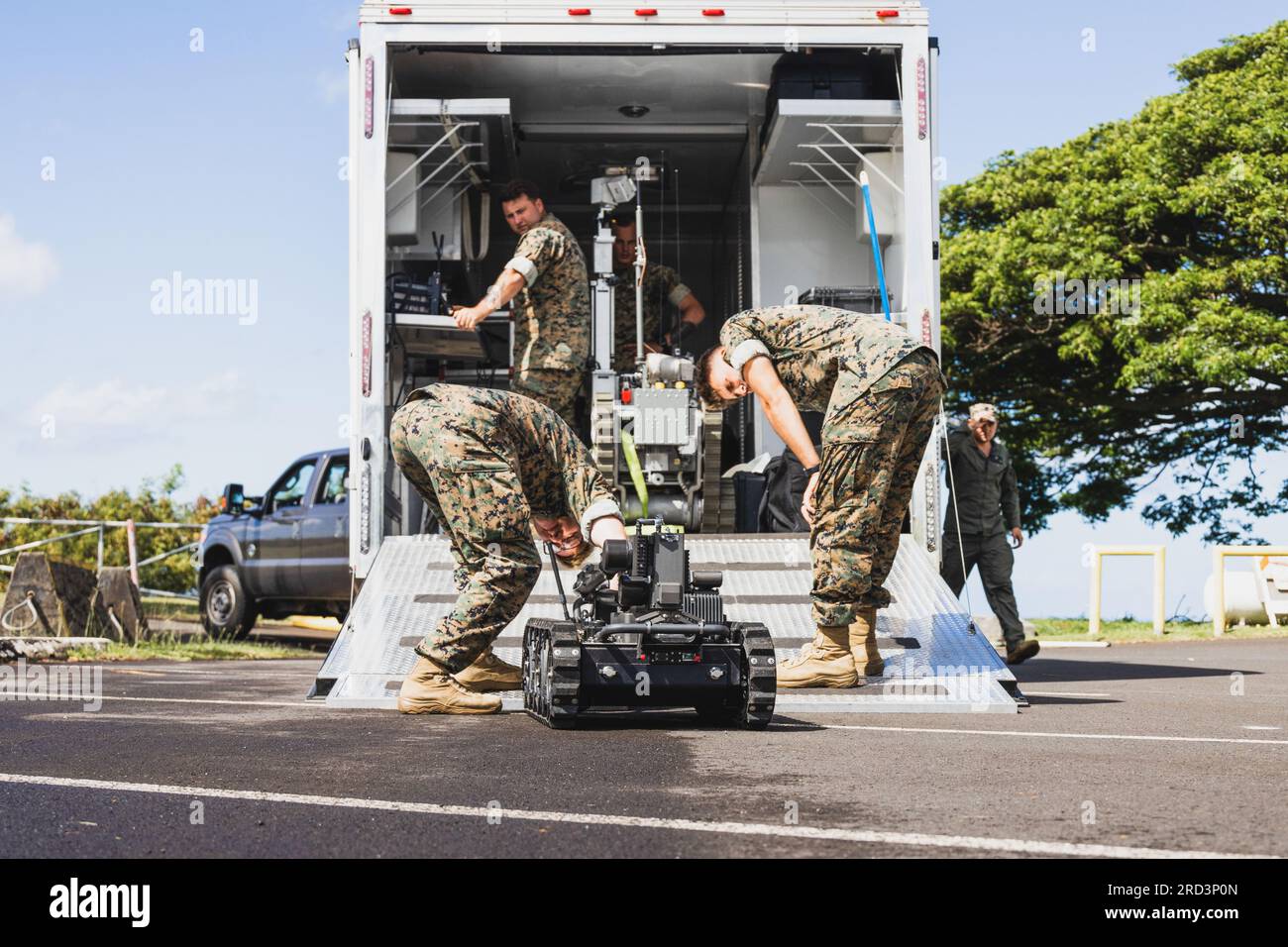 U.S. Marine Corps explosive ordnance disposal technicians with ...