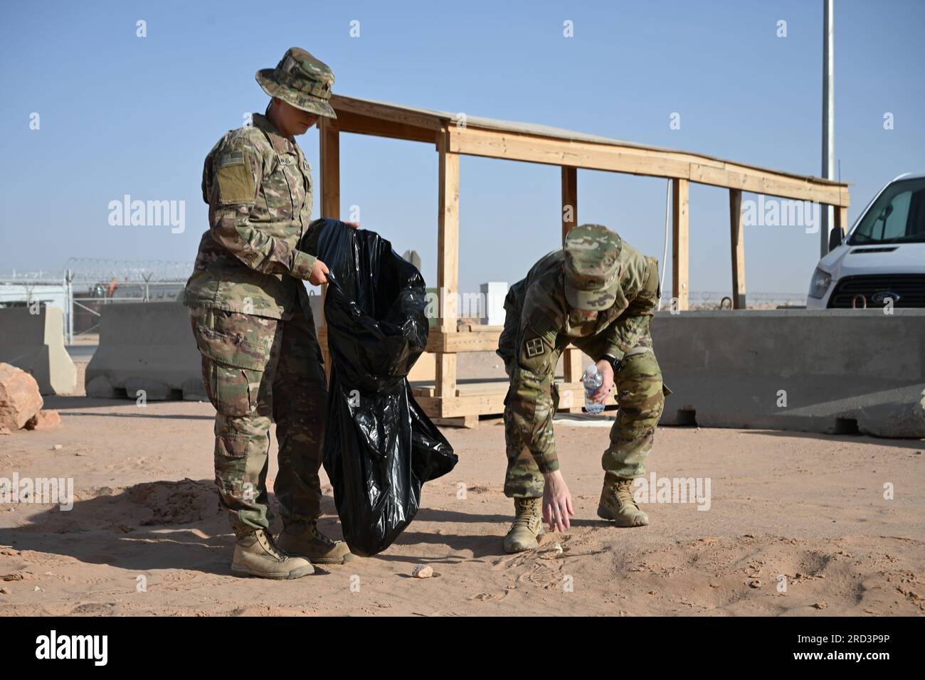 Airmen and Soldiers stationed at Prince Sultan Air Base pick-up trash ...