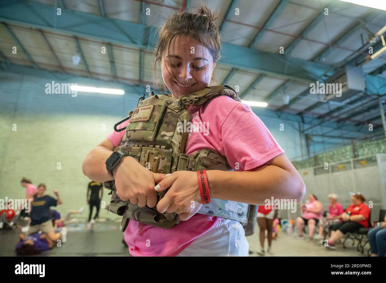 An American Legion Auxiliary Girls State program member tries on ...