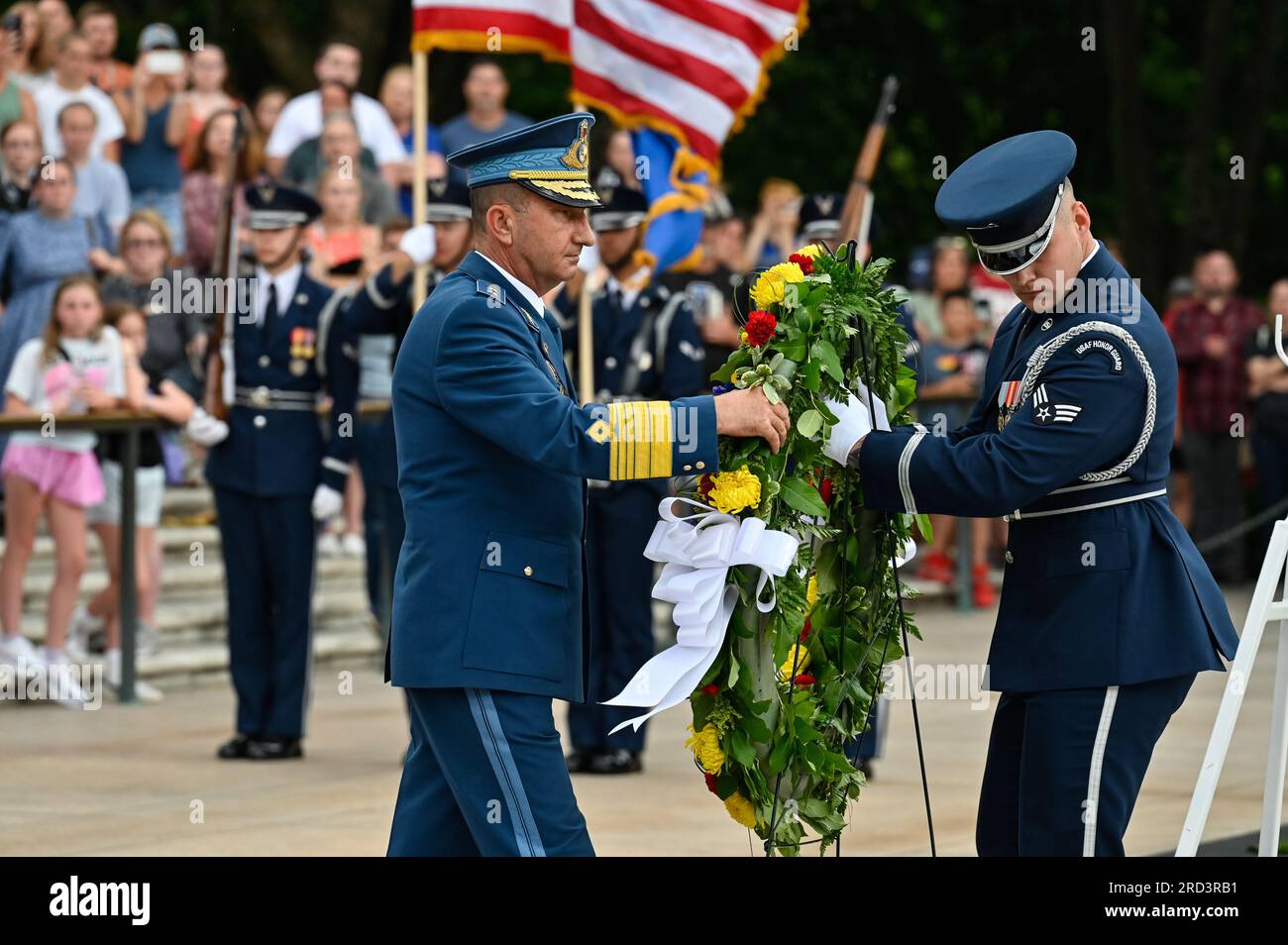 Lt. Gen. Viorel Pană, chief of the Romanian Air Force Staff, places a ...