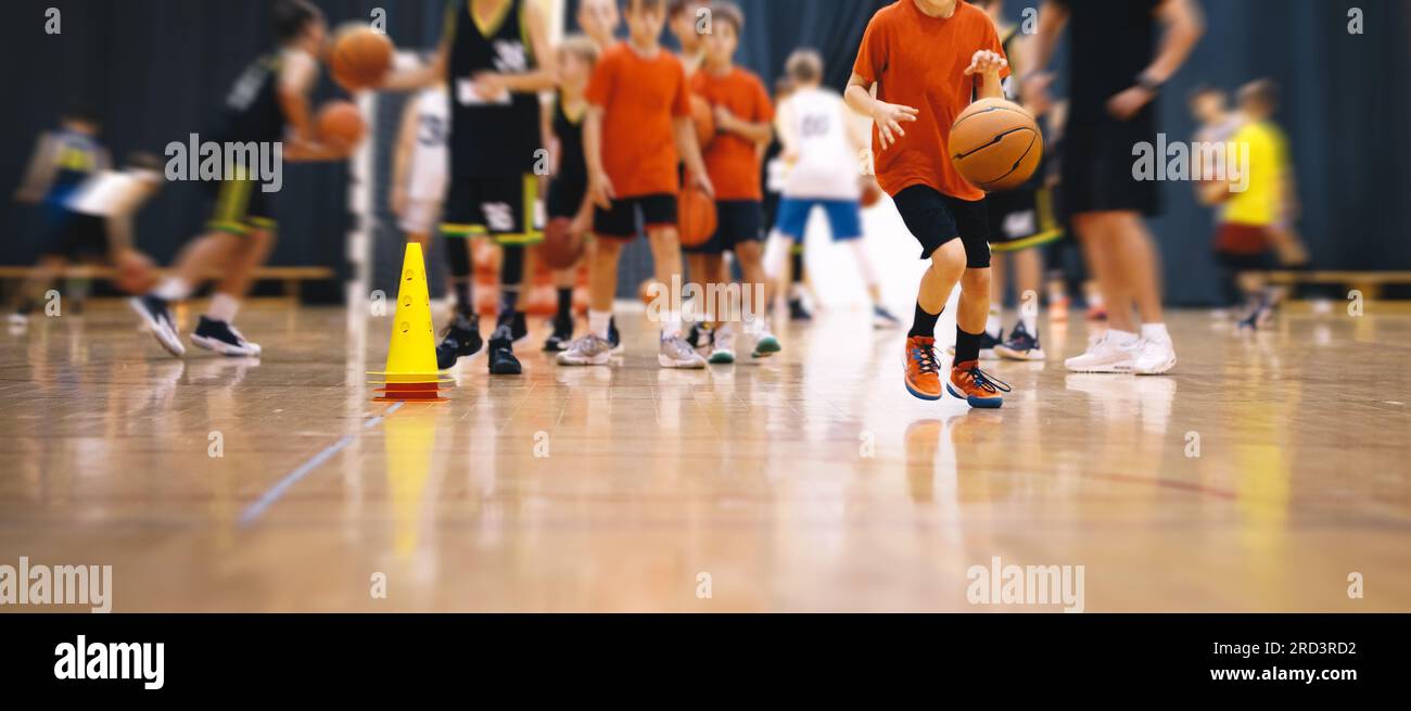 Children on basketball training. Group of school boys practicing ...