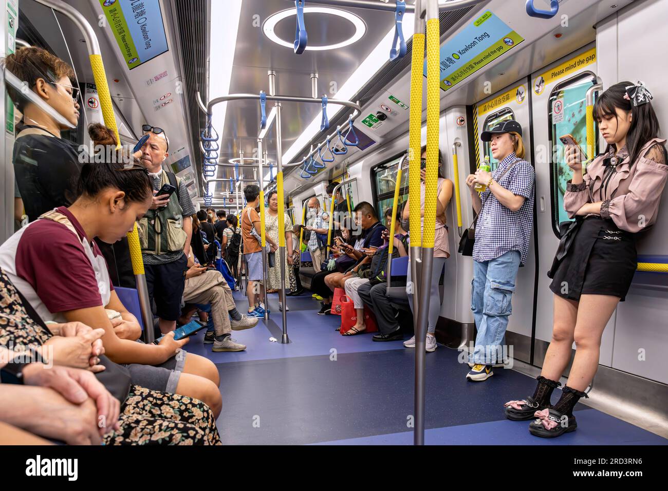 Passengers on MTR rapid transit train, Hong Kong, SAR, China Stock ...