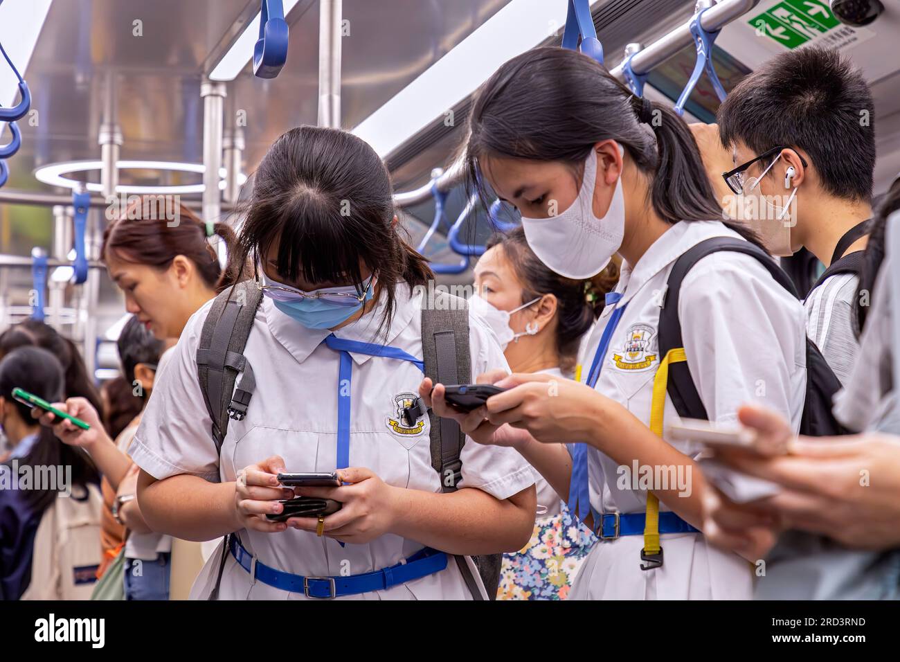 Passengers on MTR rapid transit train, Hong Kong, SAR, China Stock Photo - Alamy