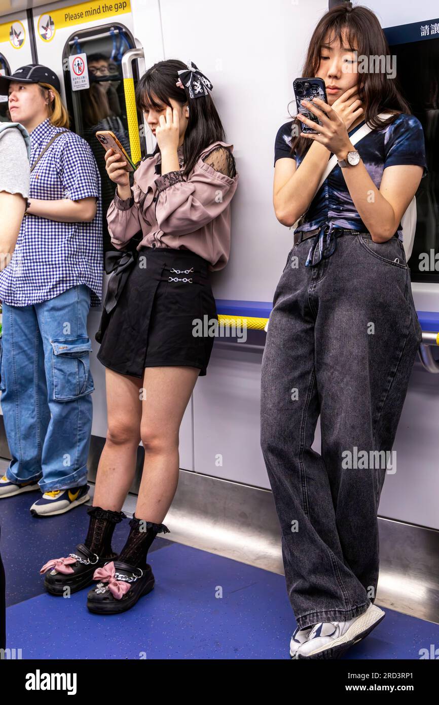 Passengers on MTR rapid transit train, Hong Kong, SAR, China Stock ...
