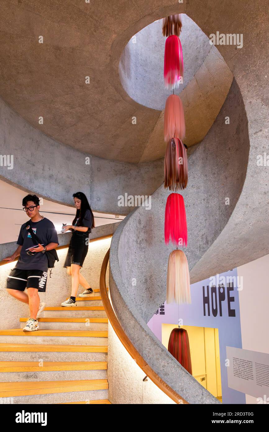 Spiral staircase and art exhibition, Tai Kwun, former Central Police ...