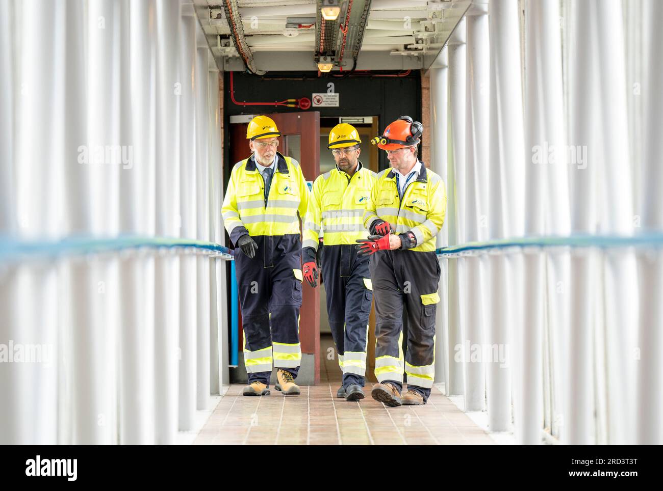 First Minister Humza Yousaf (centre) with the director of thermal ...