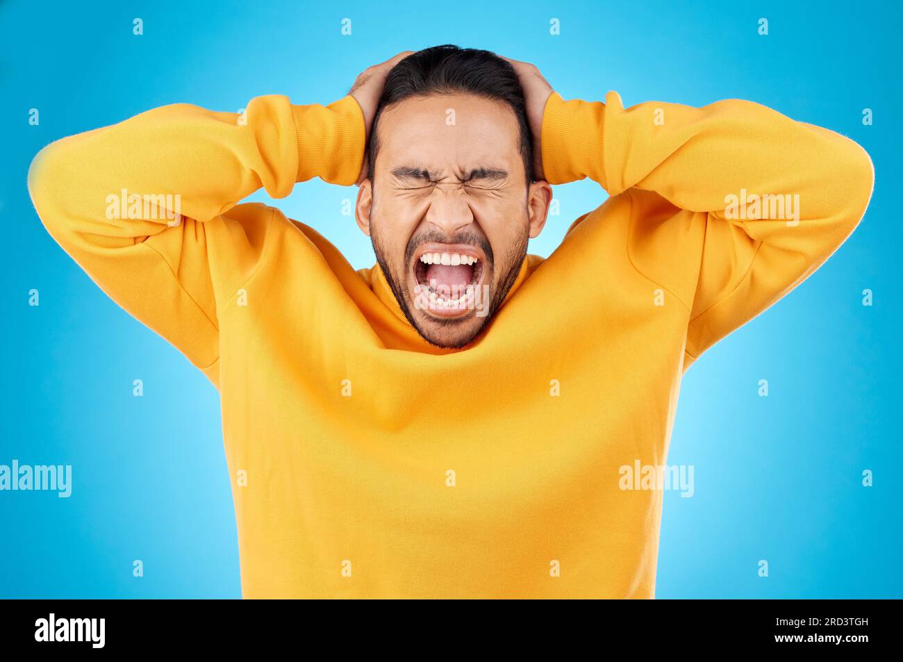 Angry, man and face with screaming in studio with burnout, anxiety and ...