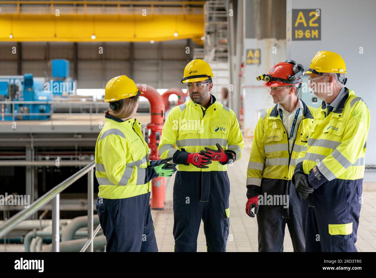 First Minister Humza Yousaf with the head of corporate affairs Helen ...