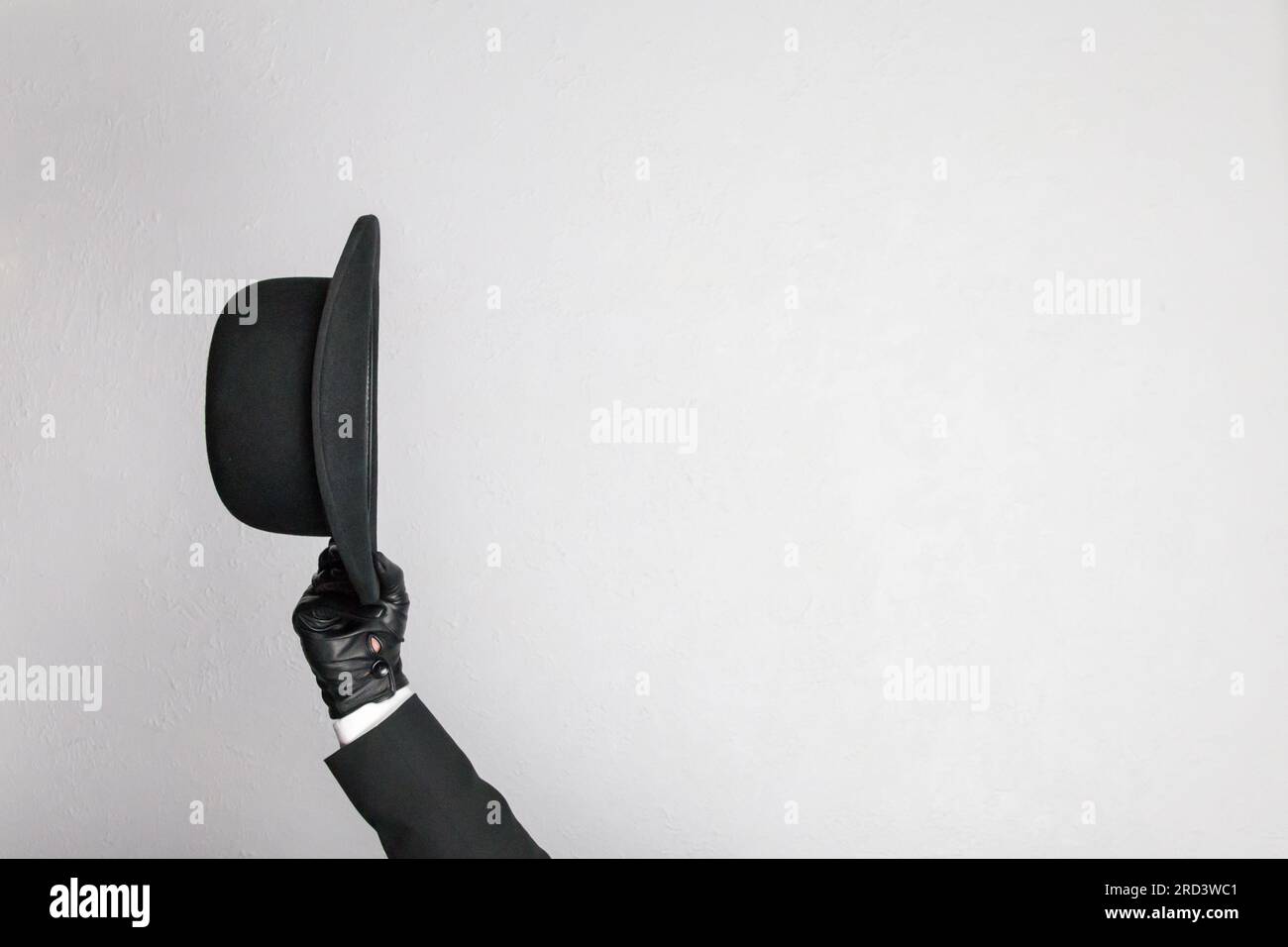 Isolated Image of Leather Gloved Hand Politely Doffing Bowler Hat ...