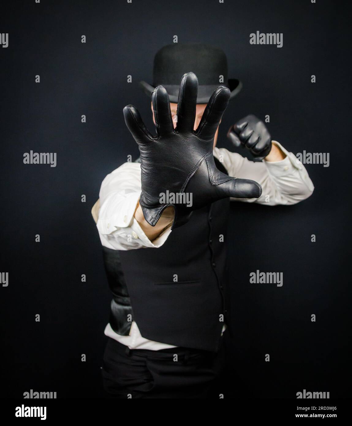 Portrait of Dangerous Vintage Fighter in Vest and Bowler Hat Standing ...