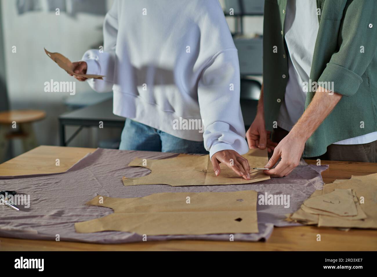 Cropped view of young african american craftswoman holding sewing ...