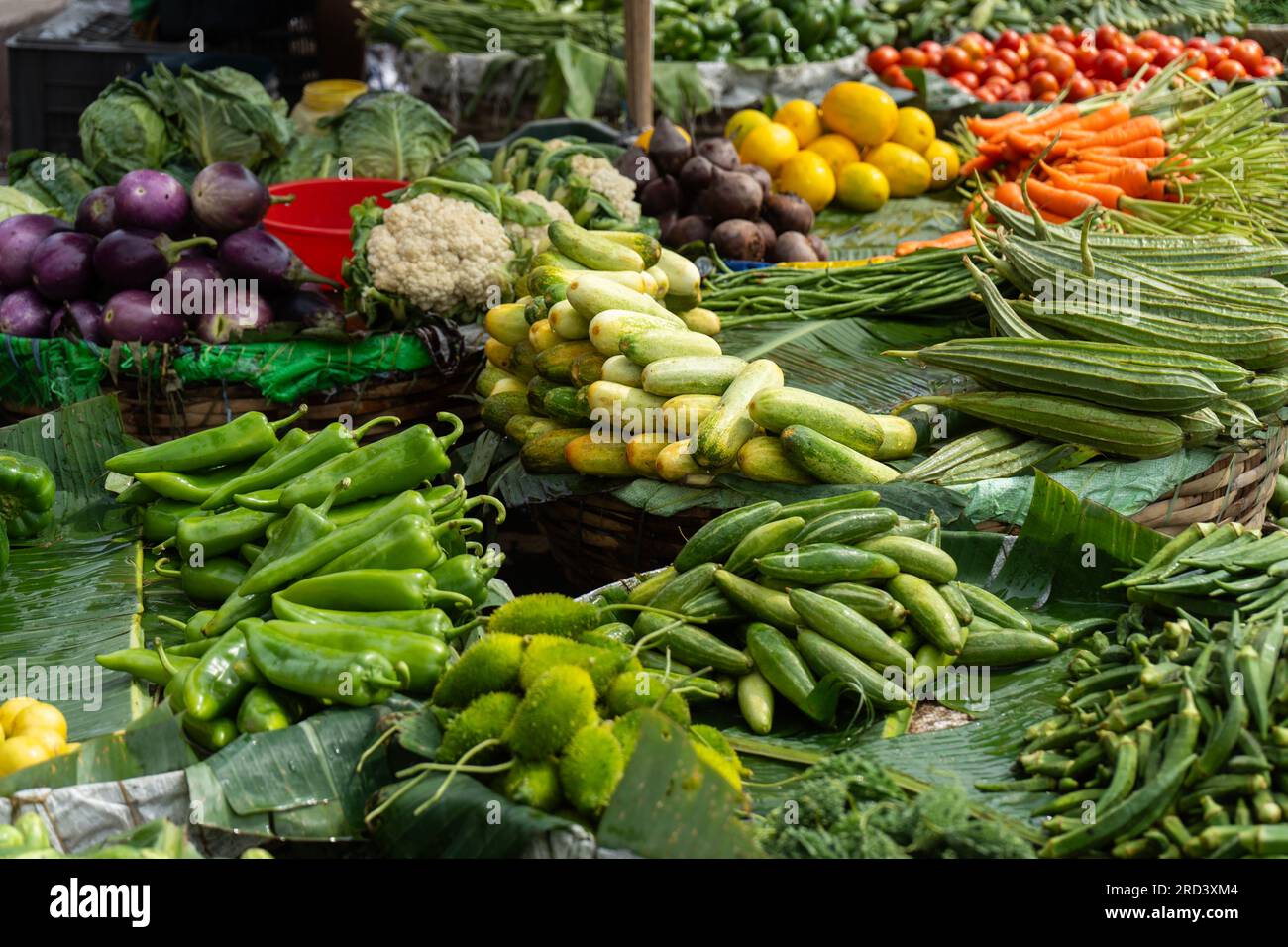 Vendor displays different vegetables at a stall to sell, in Guwahati ...