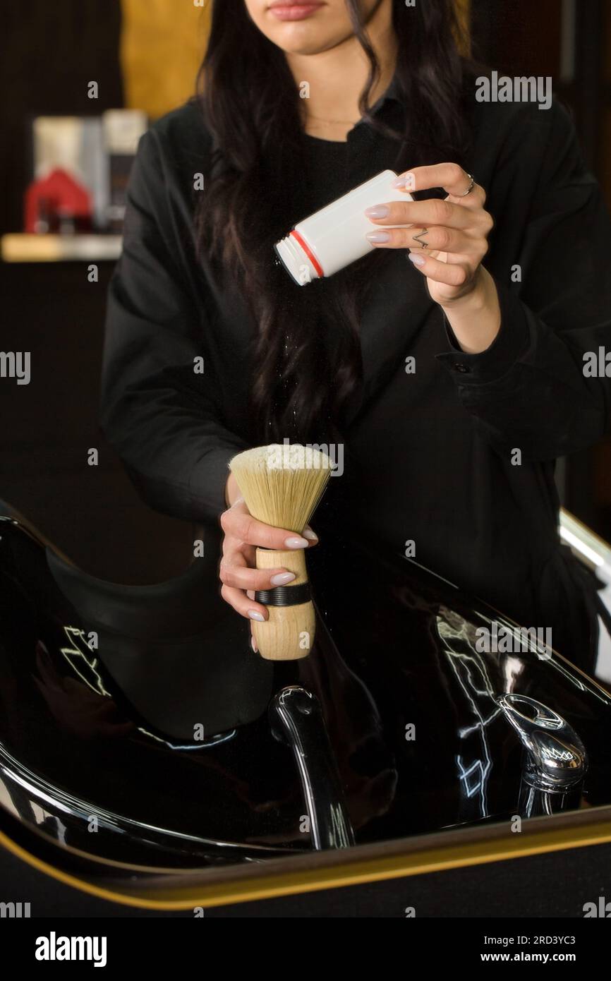 Professional hairdresser woman pours hair hi-res stock photography and ...