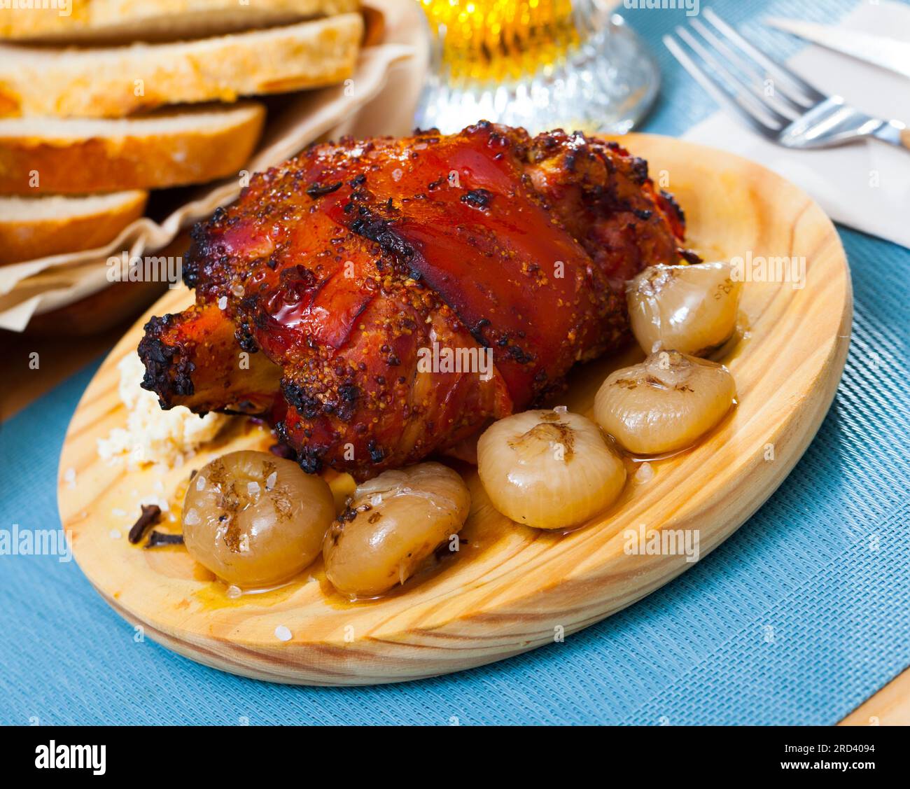 Roast pork knuckle with vegetables Stock Photo - Alamy
