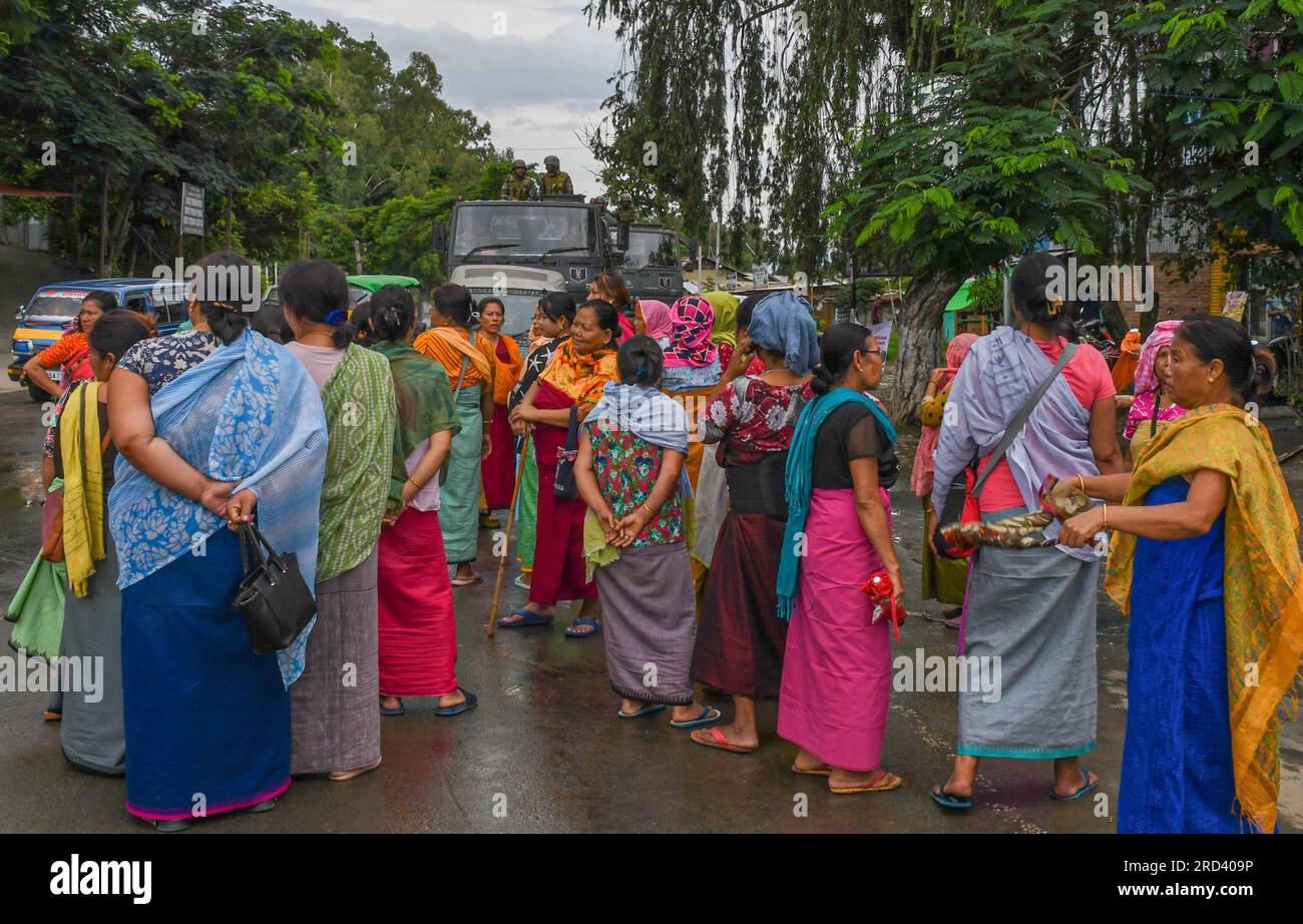 Protesters from the women's activist group Meira Paibi, block an army ...