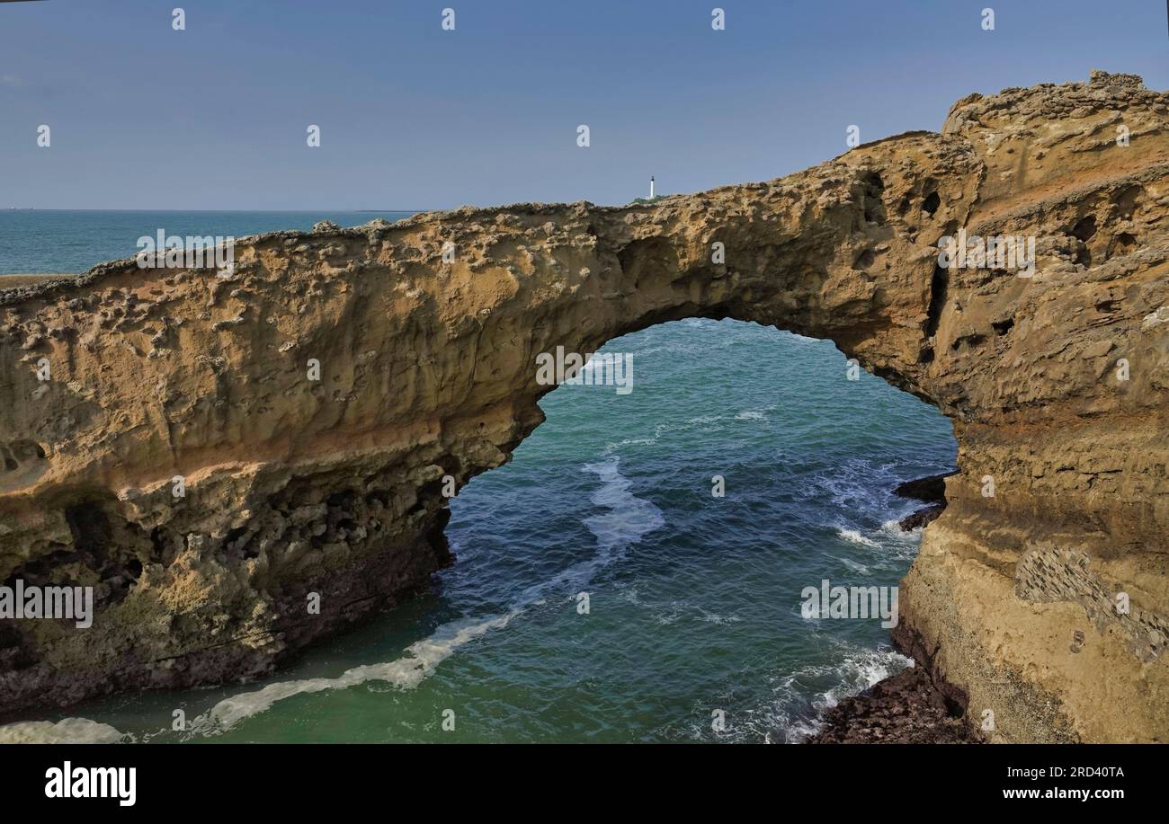 Biarritz, France, July, 2023 View of the granite bridge, eroded by sea ...