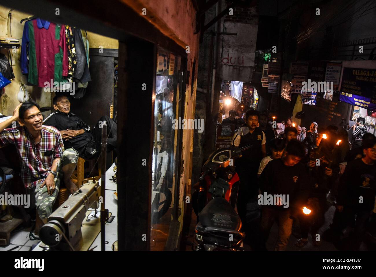 Bandung, West Java, Indonesia. July 18, 2023. Residents light torches ...