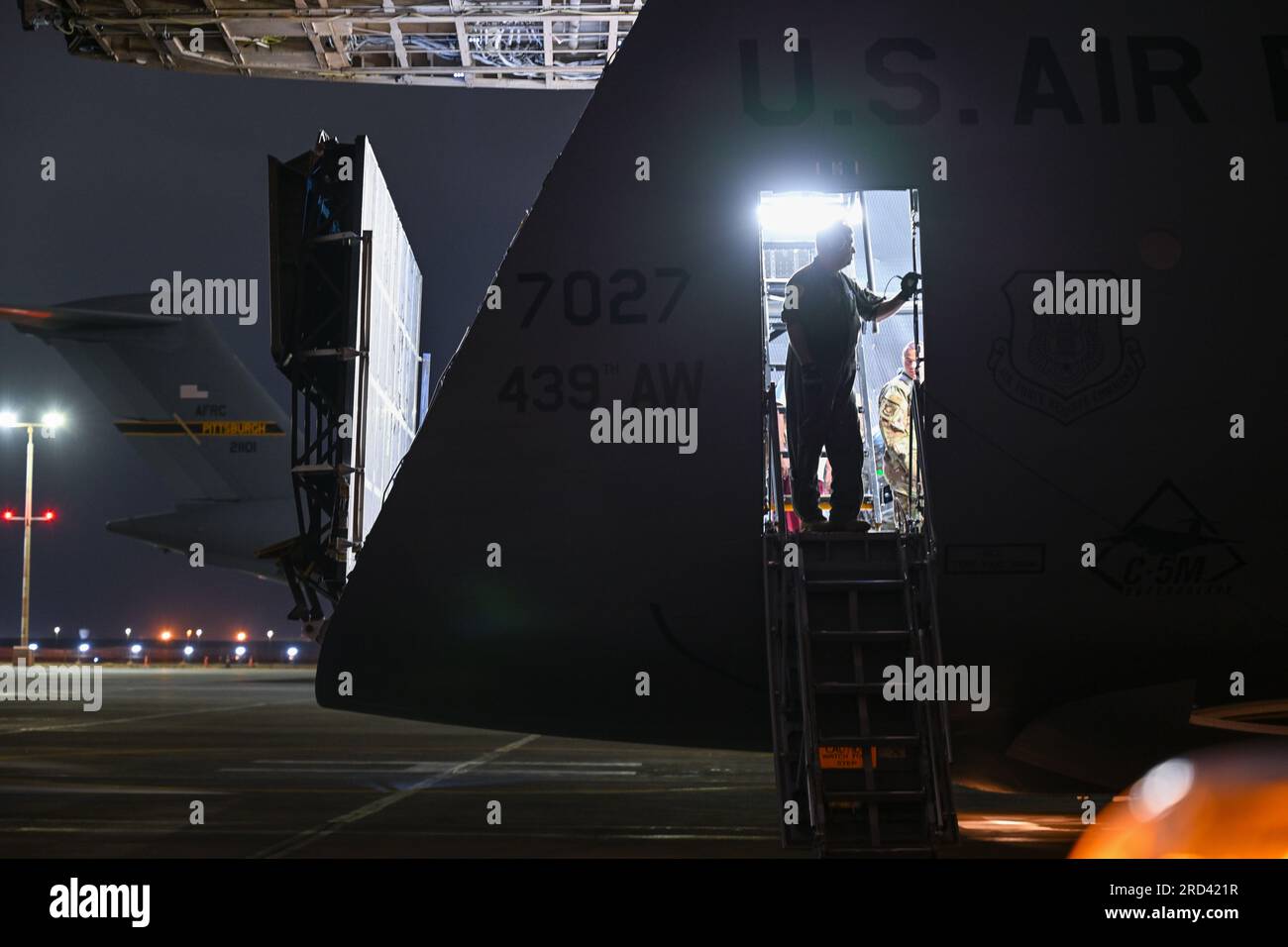 A U.S. Air Force C-5M Super Galaxy loadmaster, assigned to the 439th ...