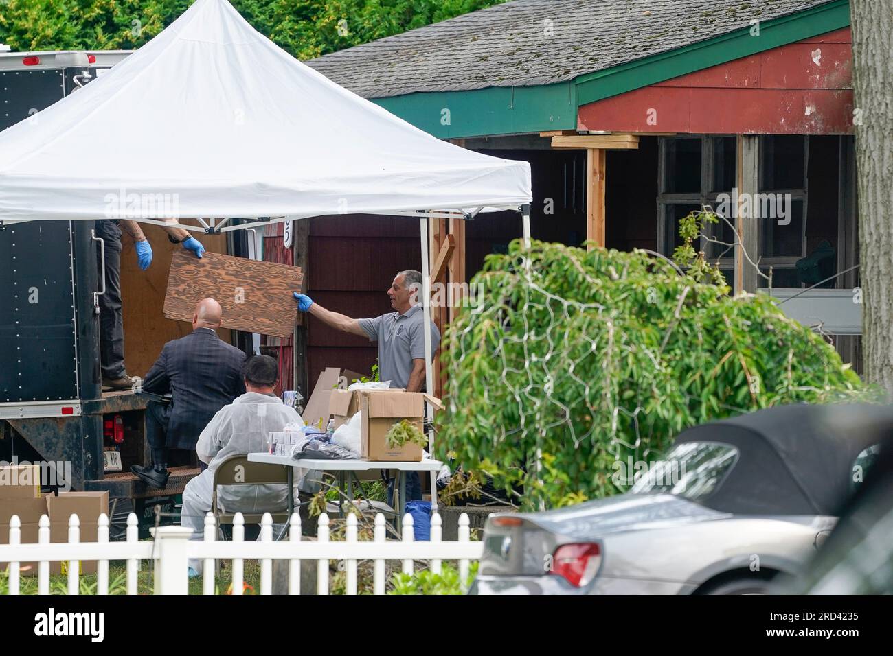 Authorities search the home of suspect Rex Heuermann, Tuesday, July 18 ...