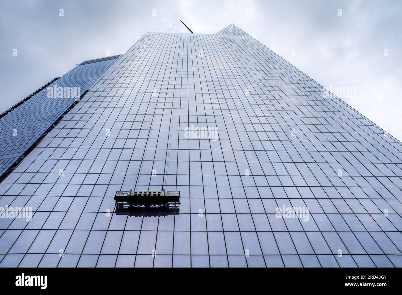 Window washers scale a high-rise office building in downtown New York ...