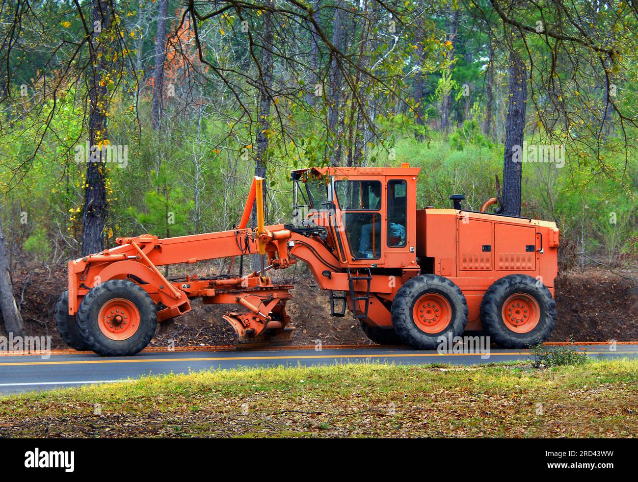 Caterpillar grader grading road hi-res stock photography and images - Alamy