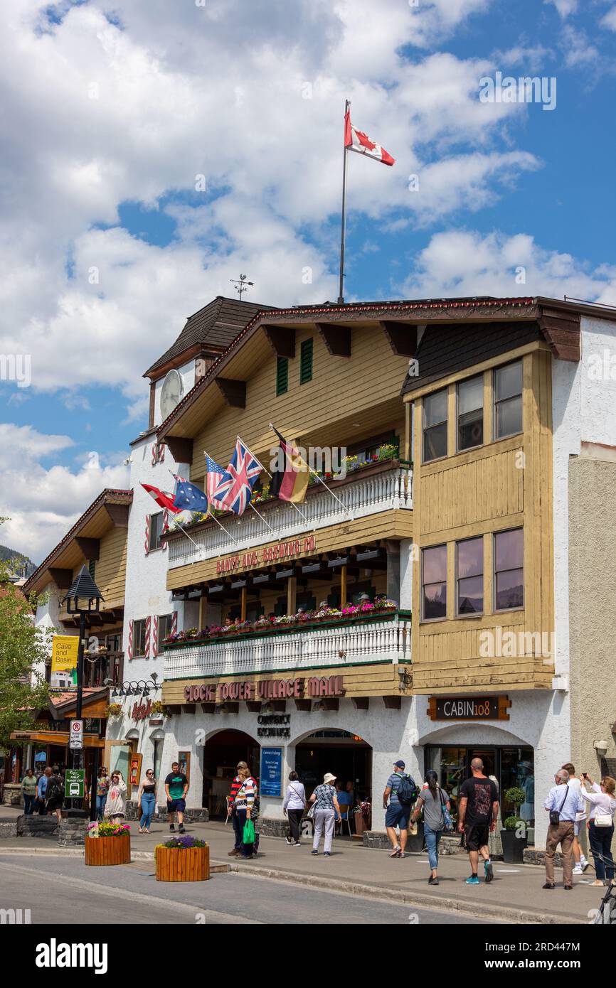 BANFF, CANADA - JULY 5, 2023 : Tourists in front of the Clock Tower ...