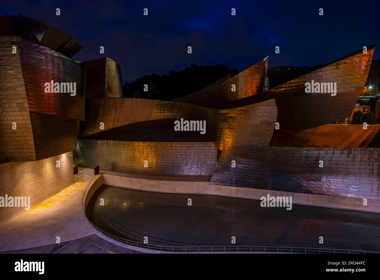 The Guggenheim Museum Bilbao designed by architect Frank Gehry, and ...