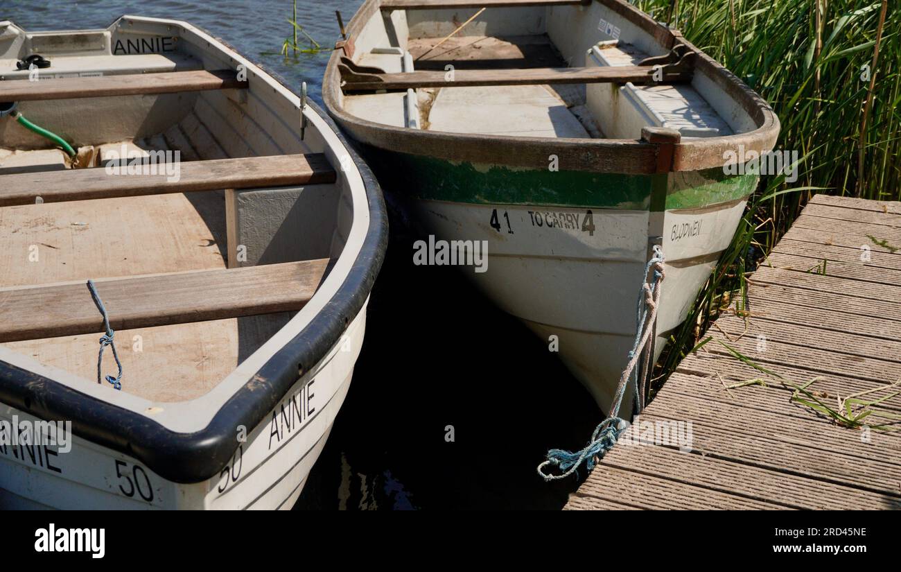 Empty rowing boats lined up waiting to be hired for trips around ...