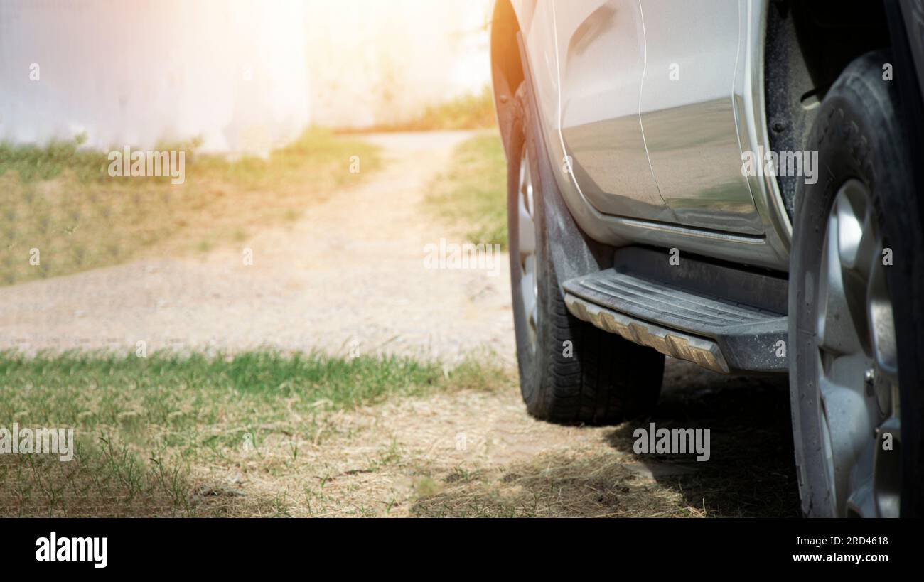 Side view of parked cars, parking field Stock Photo - Alamy