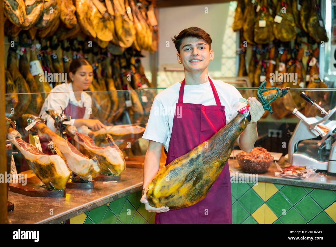 Butcher shop owner assistant hi-res stock photography and images - Alamy