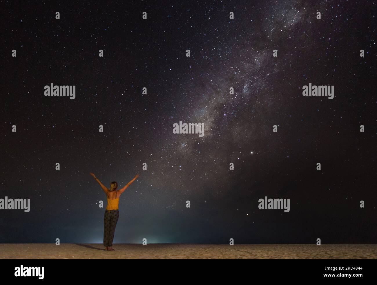 Woman sky night sand stars hi-res stock photography and images - Alamy
