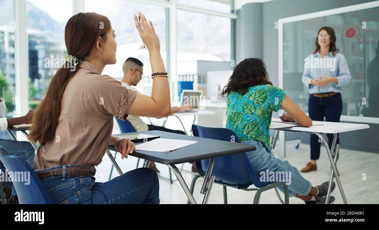 Student, question and woman in a classroom with lecture and studying ...