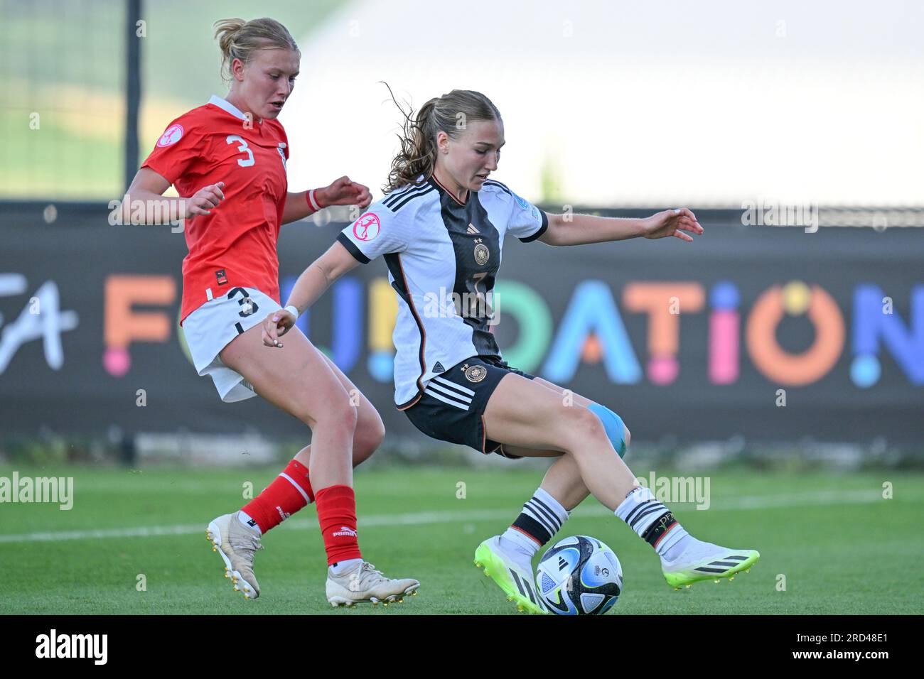 Tubize, Belgium. 18th July, 2023. Lainie Fuchs (3) of Austria pictured defending on Sophie ...