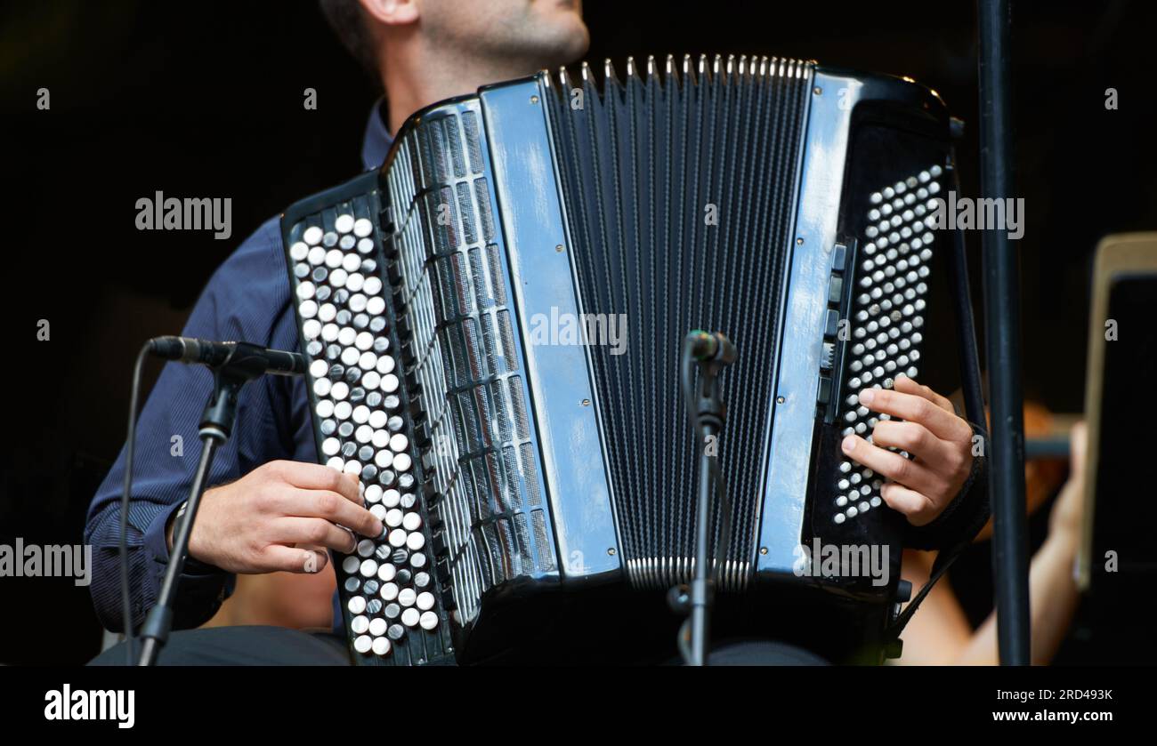 Man playing an accordian man playing an accordian hi-res stock ...