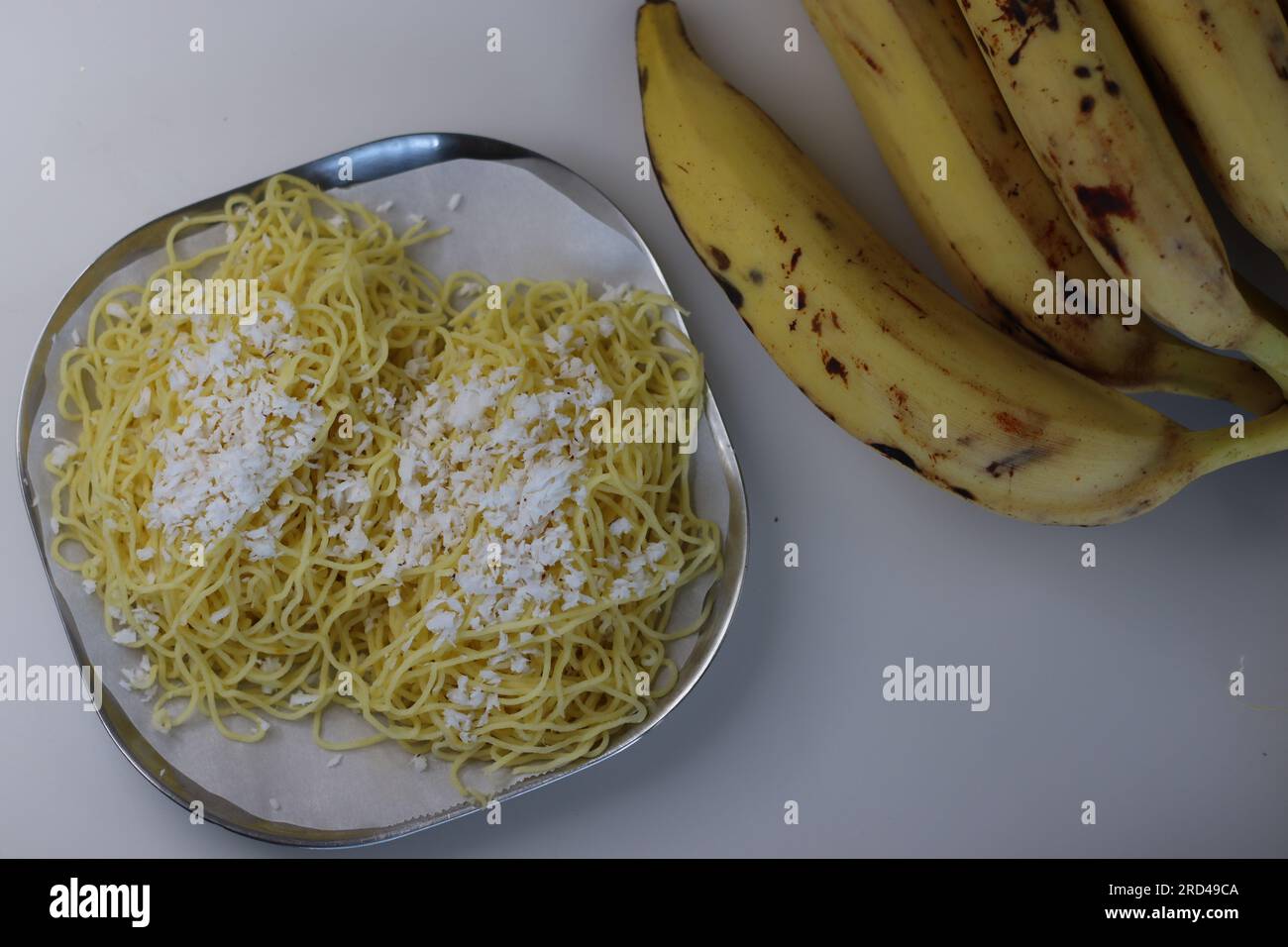 Ethakka idiyappam. String hoppers or idiyappam made with rice flour ...