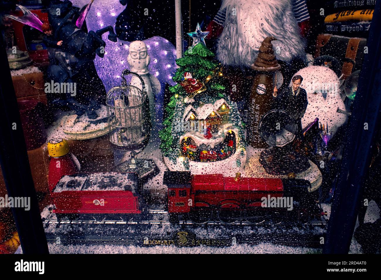 Christmas shop window, window display a snowy Christmas scene, rain ...