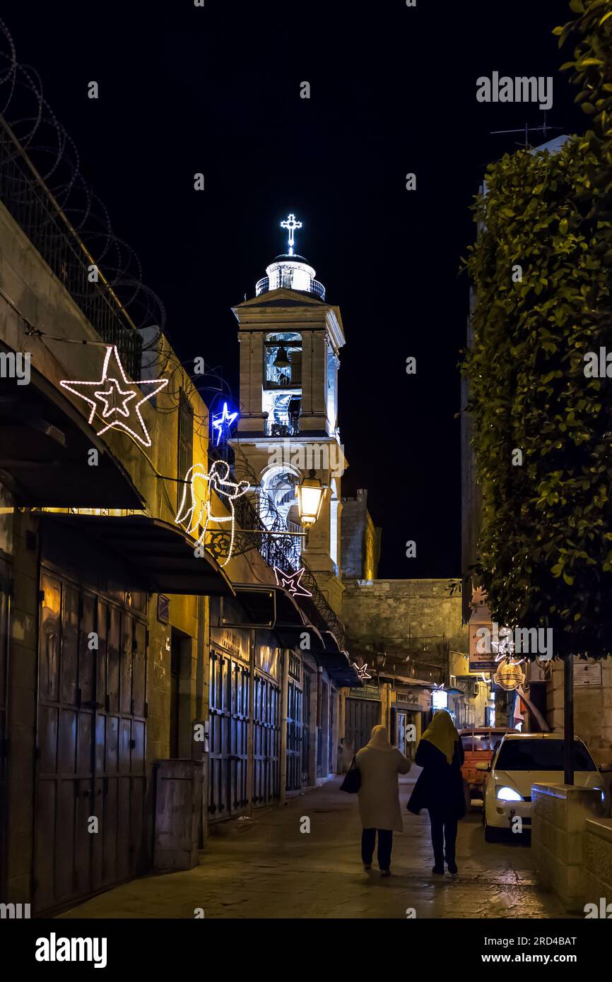 Night view of the Milk Grotto St with the bell tower of the Church of ...