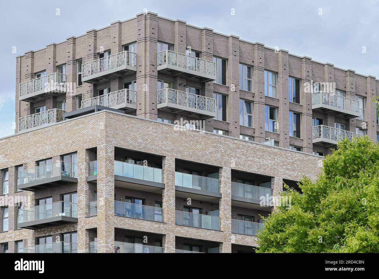 Modern apartment building with balconies and blue sky in Priory Road ...