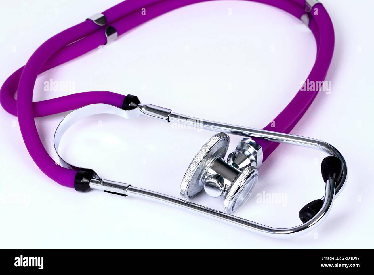 Purple stethoscope isolated on a white background Stock Photo - Alamy
