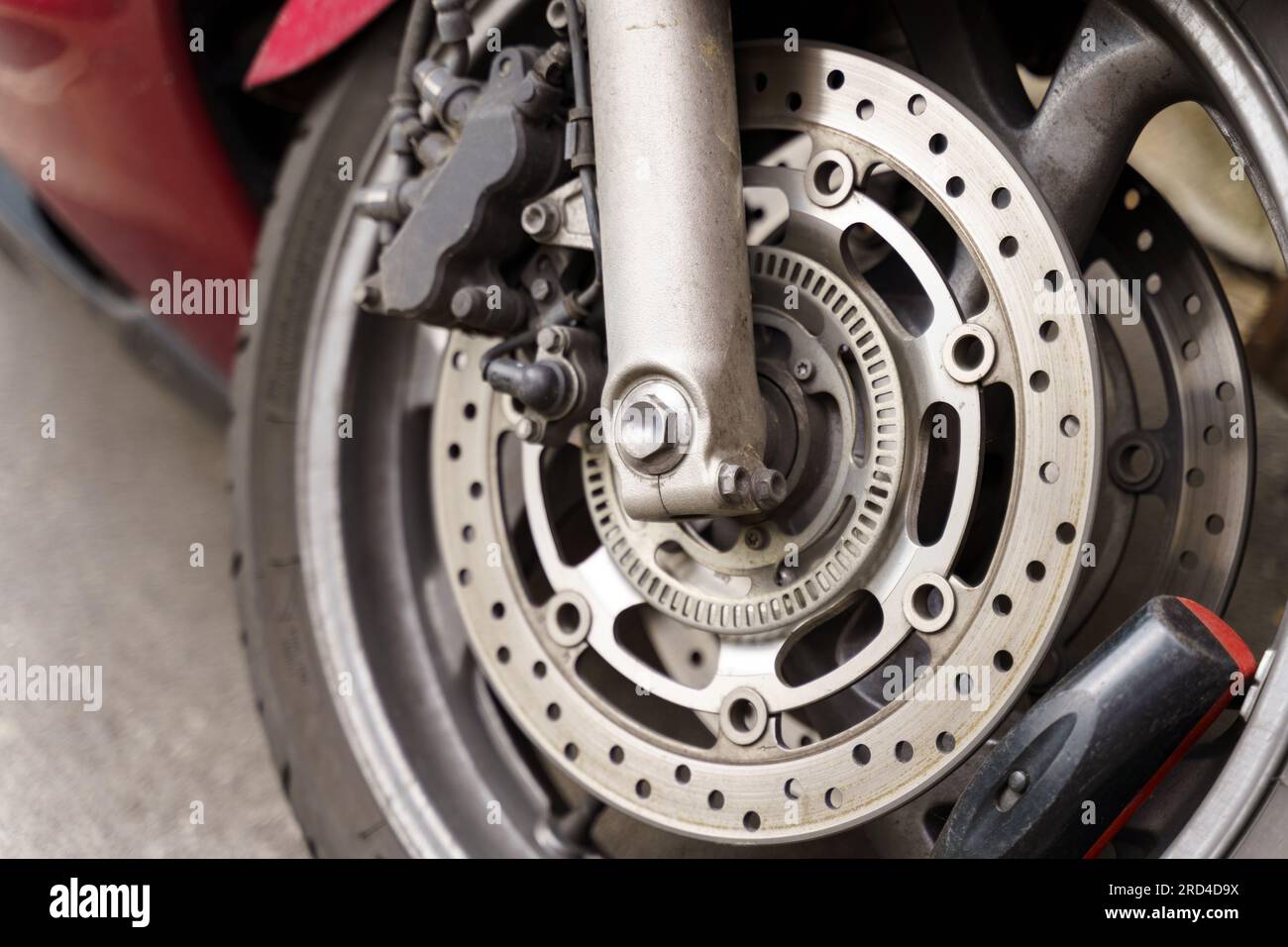 Motorcycle front wheel, alloy wheels with brake and clutch. Close-up ...