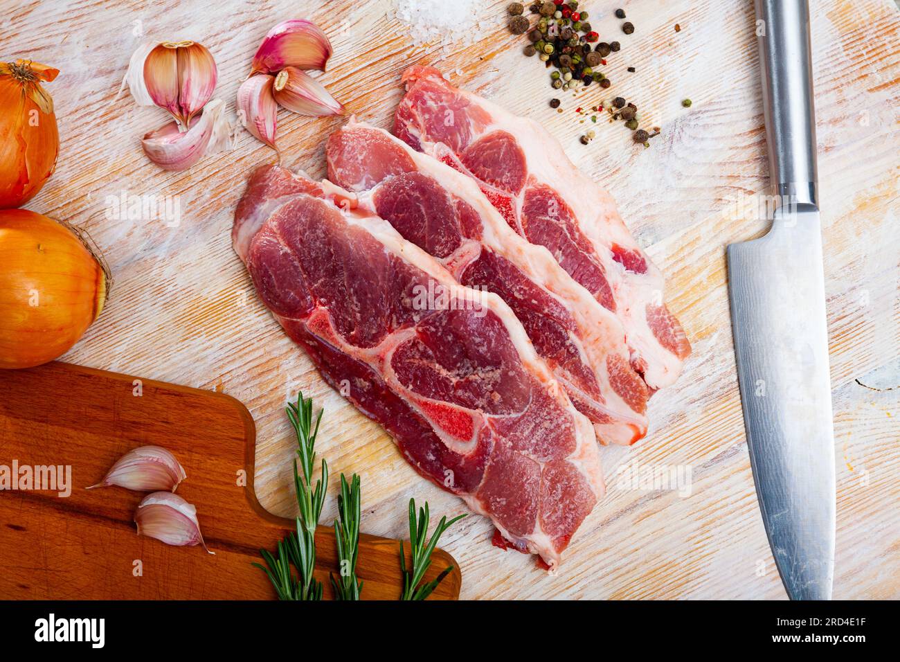 Raw pork shoulder and condiments Stock Photo - Alamy