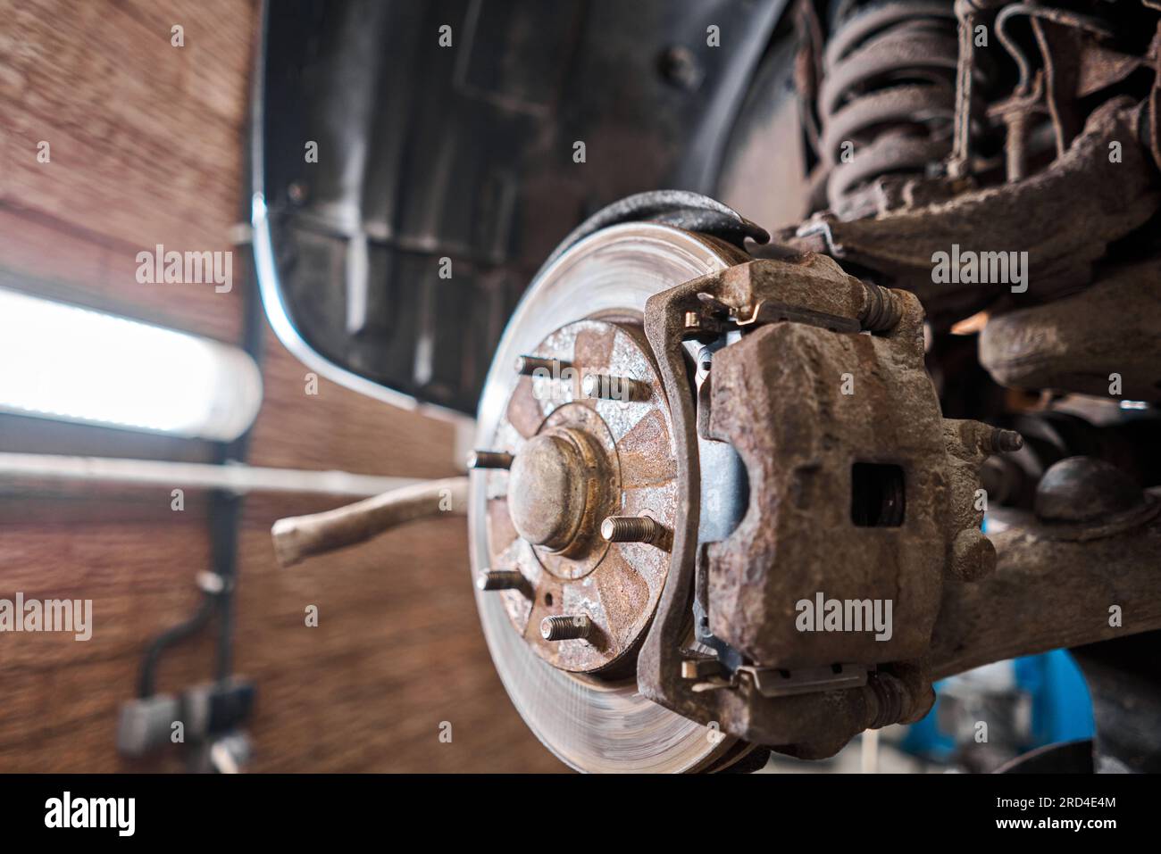 Rusty drum brakes, rear on car. Change the old to new brake disc on car ...