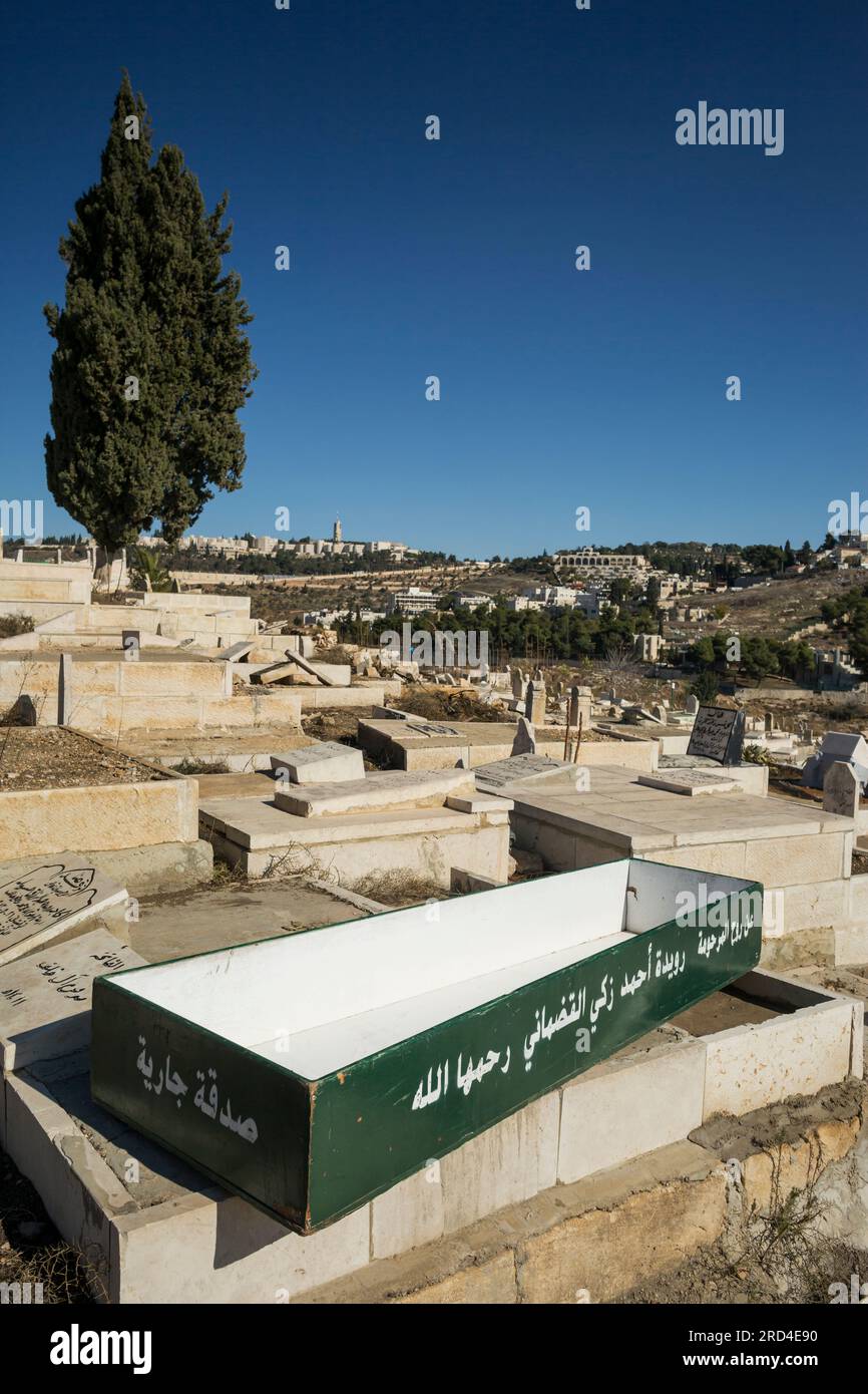Vertical view of an open coffin in Al-Yusufiye Cemetery in East ...