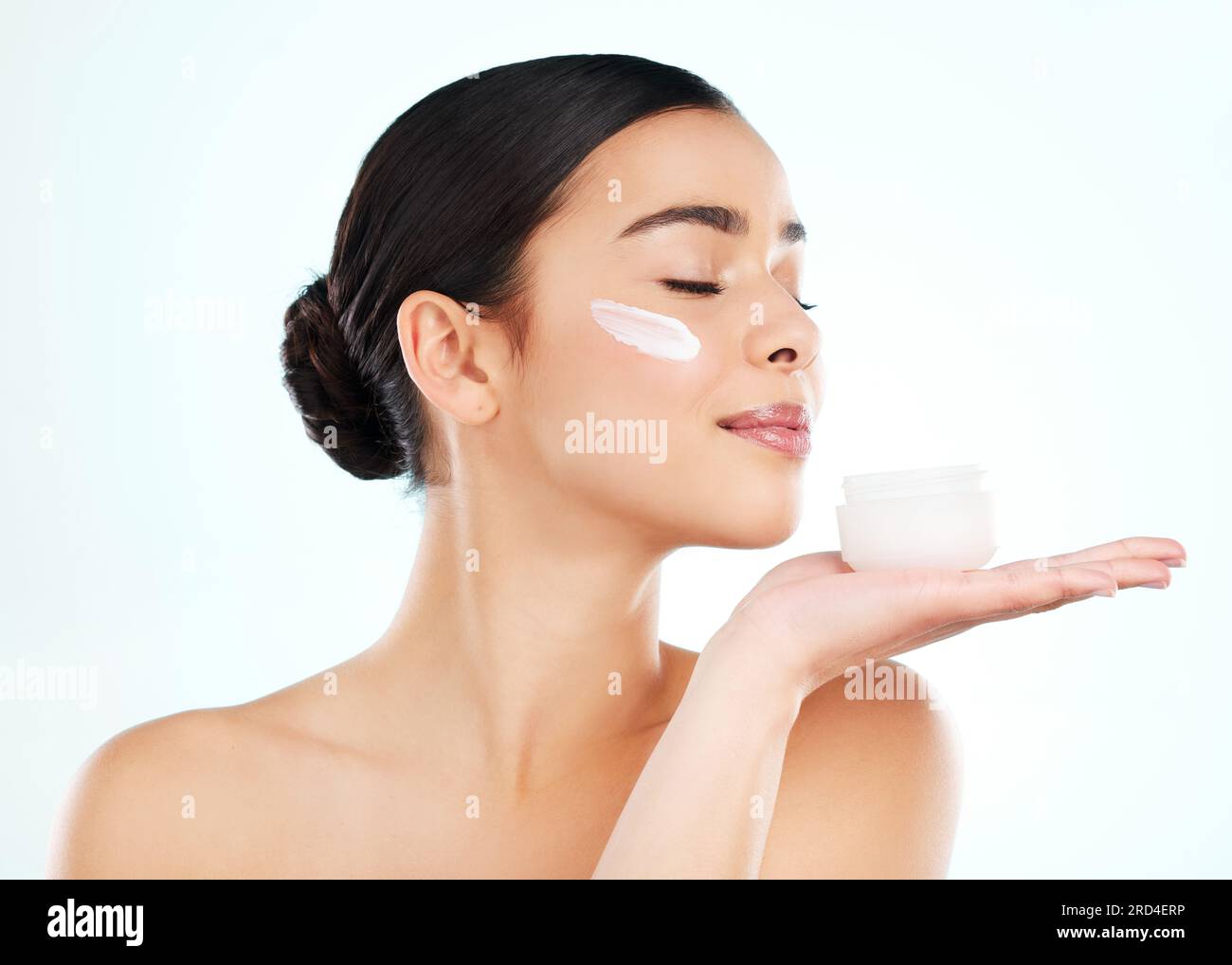 Skincare, face cream and woman with container in studio isolated on a ...