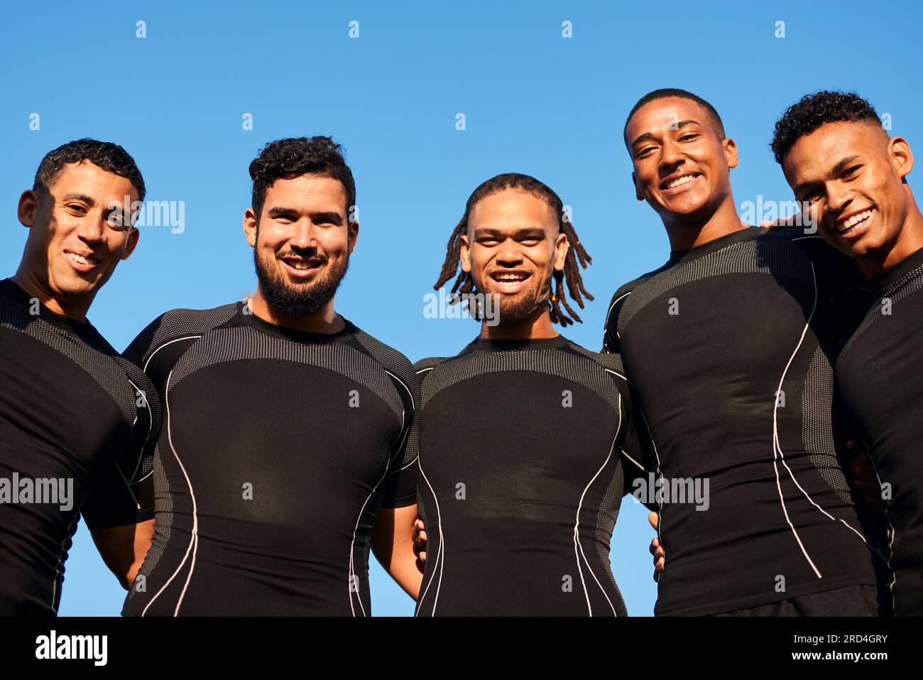 Its a beautiful day for rugby. Cropped portrait of a diverse group of ...