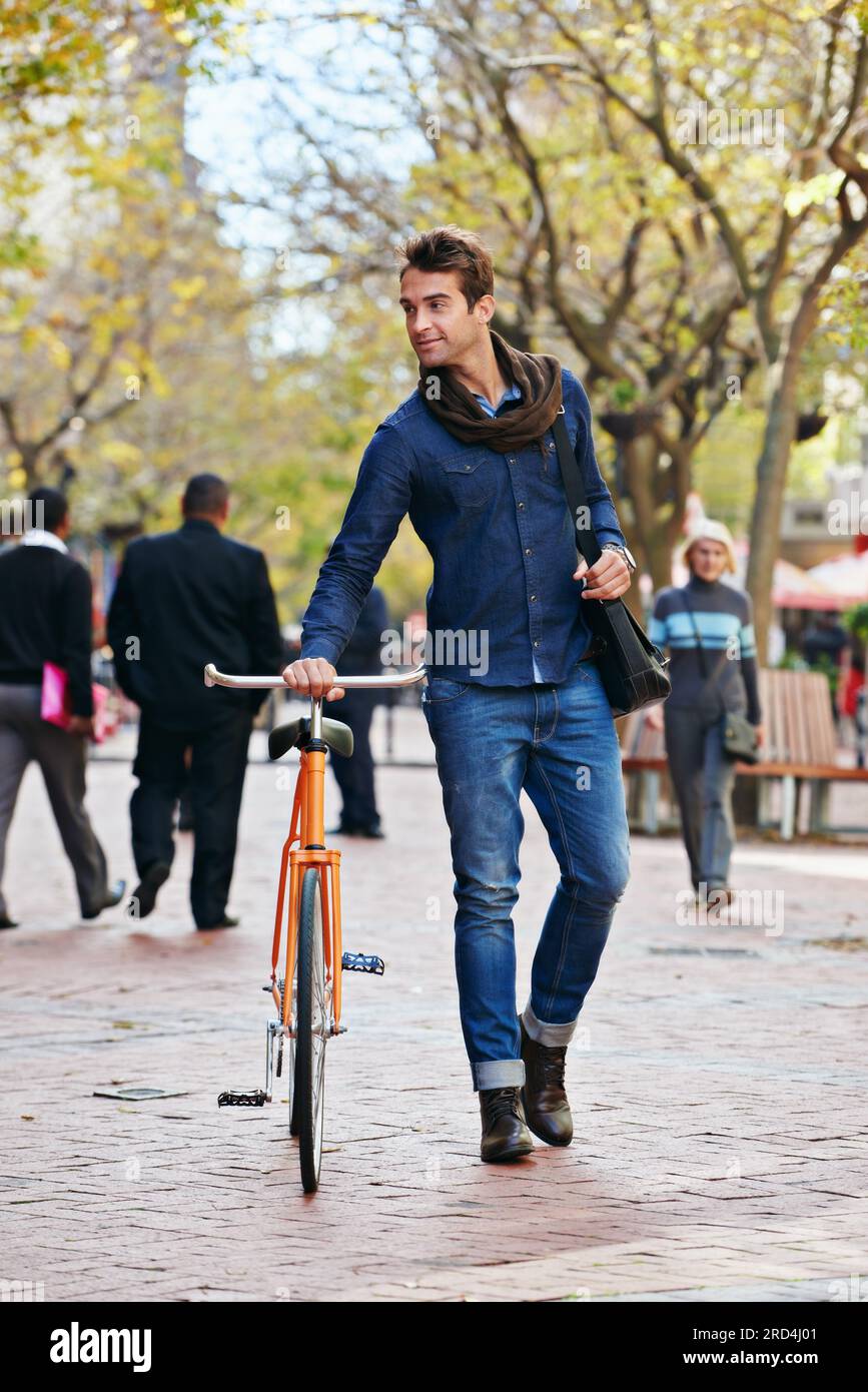 Getting around the green way. Full length shot of a handsome man in the ...