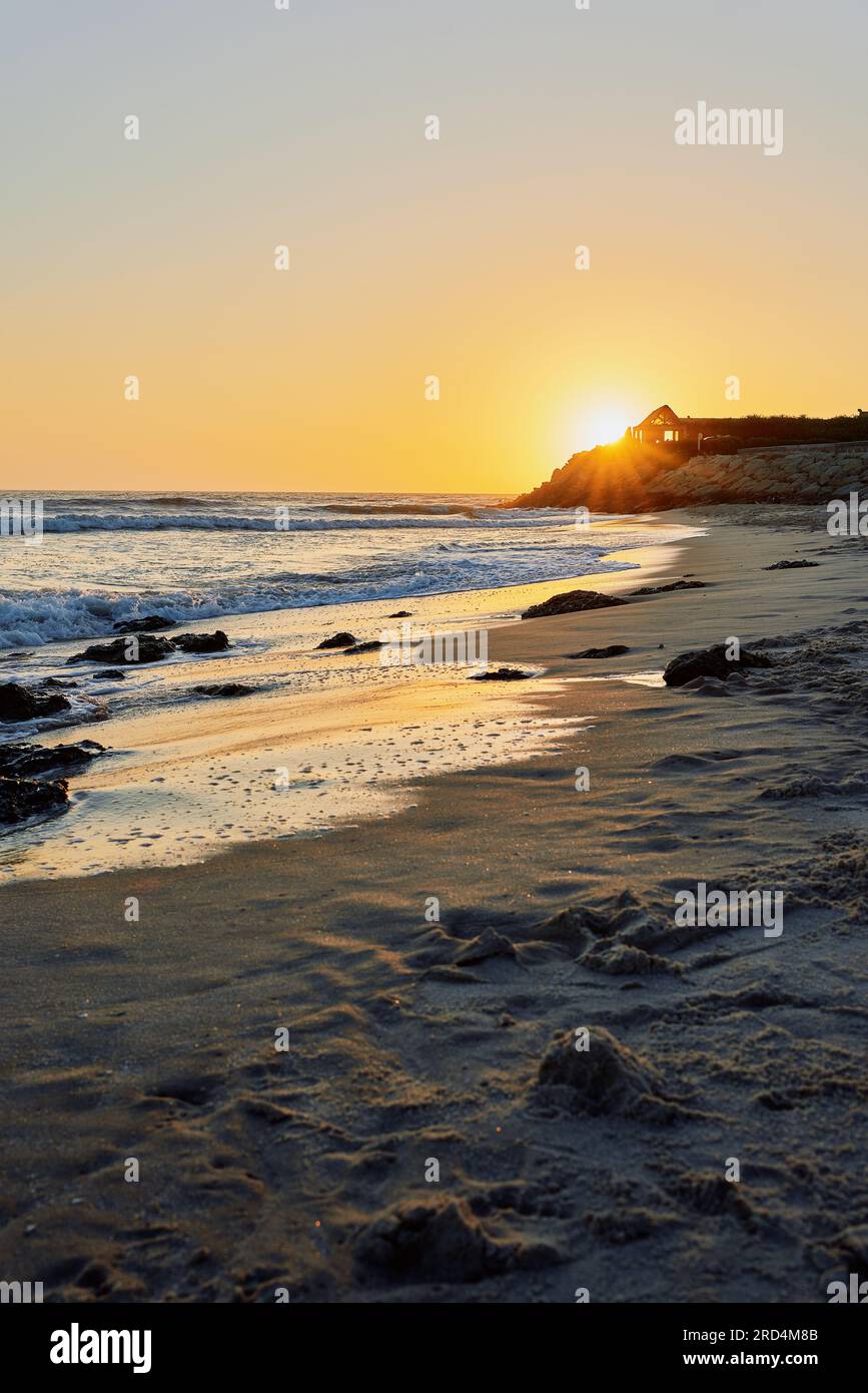Nice beach on sunset sky hi-res stock photography and images - Alamy